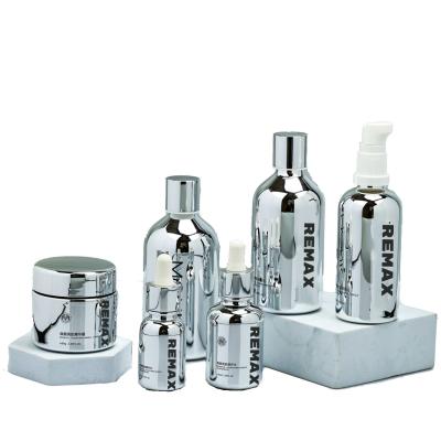 China 60g 20ml 30ml 100ml 120ml 150ml Silver-Plated Glass Cosmetics Packaging Lotion Dropper Bottle And Cream Jar Set for sale