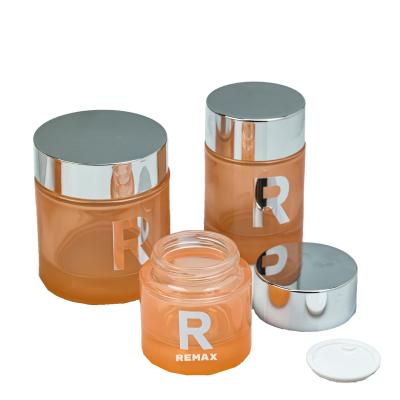 China Embalagem de cosméticos Conjunto de frasco de creme de frasco de loção de vidro transparente rosa à venda