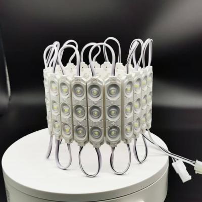 Cina Modulo LED per insegne all'aperto all'ingrosso a 3 LED SMD2835 con lente 1,2W a iniezione, modulo LED ad alta luminosità 12v in vendita