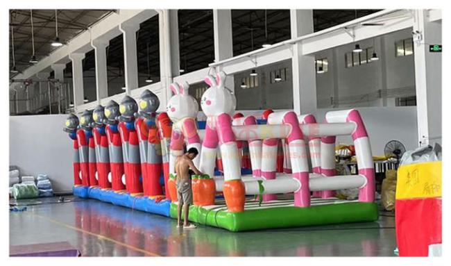 Children playing near inflatable tent