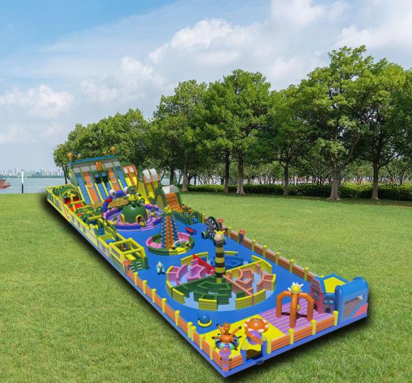 Quality Inflatable Large Theme Park With Maze Obstacles Big Slides Ball Pool for sale