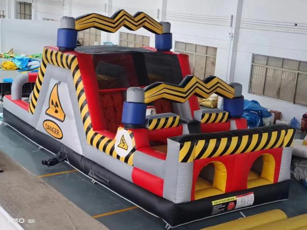 Quality Danger Obstacles Inflatable Bounce House Castles With Two Slides for sale