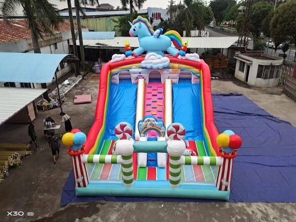 Quality Rainbow Horse Two Parallel Channels Inflatable Slides With Candy Shaped Pillars for sale
