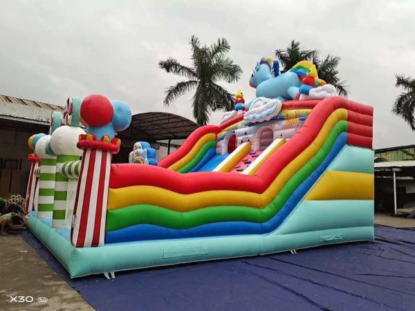 Quality Rainbow Horse Two Parallel Channels Inflatable Slides With Candy Shaped Pillars for sale