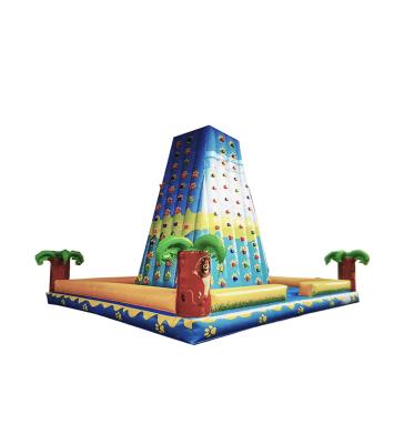 China Inflatable Rock Climbing Attraction with Lion and Palm Tree Design for Children's Outdoor Fun for sale