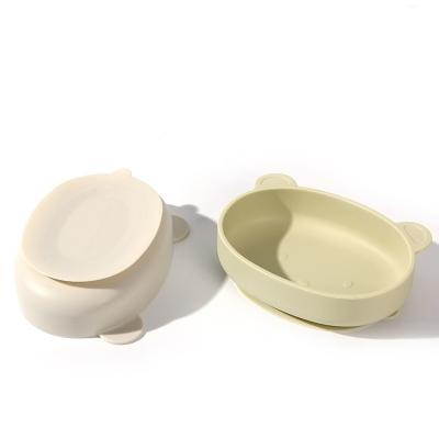 Cina piastrina supplementare dell'alimento della ciotola del bambino del silicone 50K con la ciotola resistente della caduta dei bambini del fumetto dell'orso del coperchio in vendita