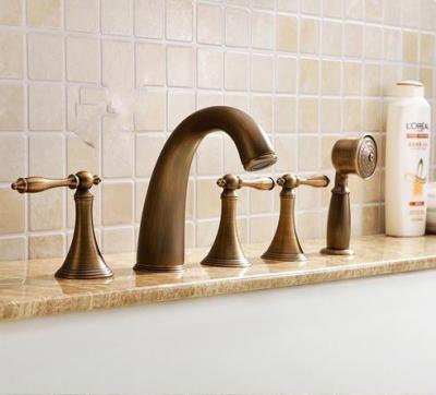 China 2016 Antique Brass Classic Widespread Tub Faucet with Hand Shower FBT0677 for sale