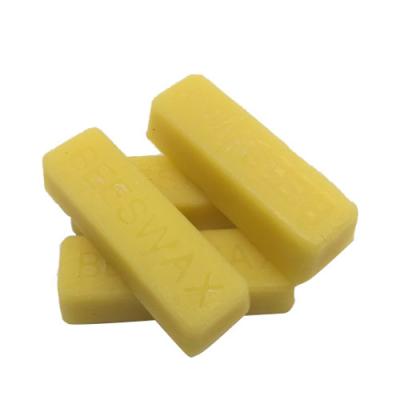 Cina Palline pure farmaceutiche della cera d'api dell'OEM 100% per la pelle asciutta del balsamo di labbro in vendita
