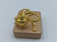 China Custom Embossed Gold Plated Keyring 25mm Durable Promotional Gift for sale