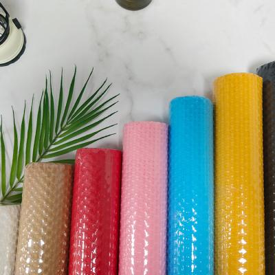 China 80G-120G Embossed Kraft Paper Roll 700x700mm for Eco Packaging for sale