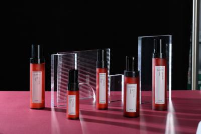 Cina Il colore rosso d'imballaggio cosmetico vuoto dell'insieme ha glassato la stampa della bottiglia del siero della crema di fronte in vendita