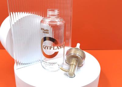 Cina Il cosmetico di plastica dell'idratante di modo imbottiglia la pompa acrilica di timbratura calda dell'oro 100ml 150ml in vendita