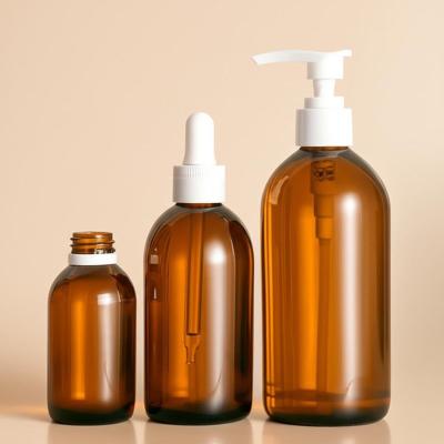 중국 아름다움 의 제품 을 편리 하게 보관 하고 분배 하기 위한 둥근 앰버 화장품 병 판매용