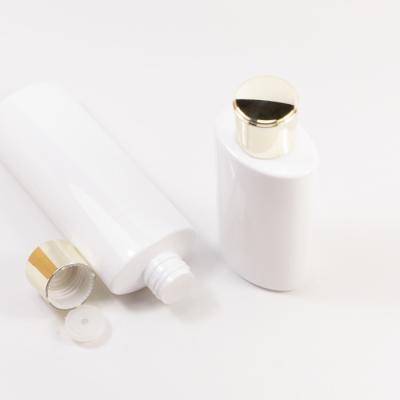 Cina Bottiglie cosmetiche di plastica bianche del giro 150ml 200ml con il cappuccio dell'oro in vendita