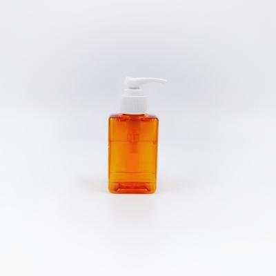 中国 トナーのシャンプーのための100ml 3.38ozのオレンジのプラスチック正方形のびん 販売のため