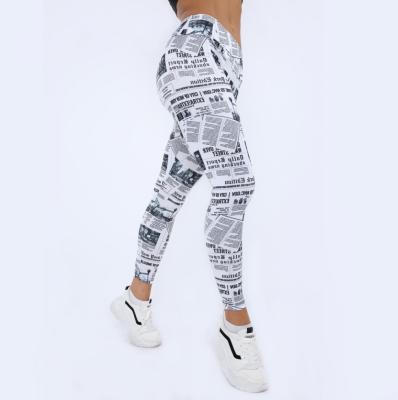 China YBPD-0002,European gradual change four needle six line digital printing newspaper yoga tight ninth women pants for sale