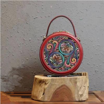 China GBBB-0002,yiwu factory women leather hand carved shoulder small round bag for sale