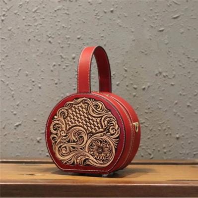 China GBBB-0003,yiwu factory lady leather hand carved single shoulder small round bag for sale