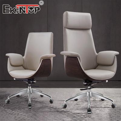 China Modern Style Manager Leather Office Chair With Wheels Ergonomic Drafting Chair à venda