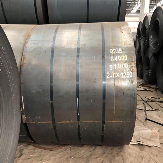 Close-up view of cold rolled black carbon steel coil showing surface texture and coating quality