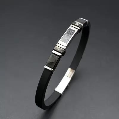 Cina Stainless Steel Soft Rubber Bracelet with Carbon Fiber Plate Punk Style White Setting CZ Silicone Luxury Men's Jewelry in vendita