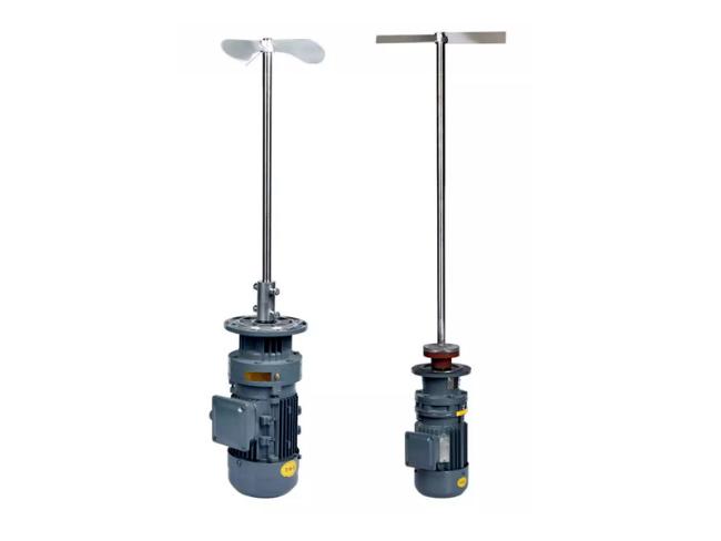 Operational view of paddle agitator actively mixing industrial liquids