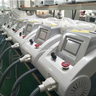 China Q-Switched Nd Yag Laser 1064 1320 532 nm remoção de tatuagens peeling de carbono máquina de beleza portátil à venda