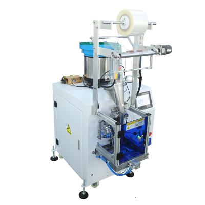 China Hardware Screws Nuts Vibrating Bowl Lamination Film Roll Sealing Packaging Machine for sale
