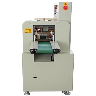 China Air Conditioner Packaging Glue Plug Hole Accessories Switch Mask Horizontal Downward Paper Type Packaging Machine for sale