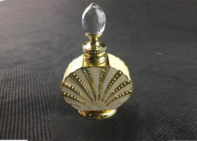 China Golden Color Refillable Glass Perfume Bottle , Customize Shape Mini Fragrance Bottles for sale