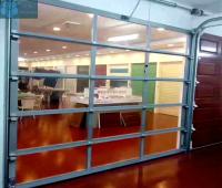 China UV Proof 3mm 5000mm Width Glass Panel Garage Doors for sale