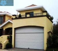 China 500mm Panel Single Track Sectional Overhead Door for sale