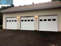 China Polyurethane Foam IP55 Sectional Overhead Door Automatic for sale