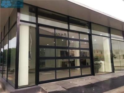 Cina Porte sezionali commerciali del pannello di vetro di alluminio della struttura per la sala d'esposizione in vendita