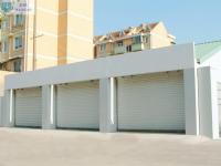 China Commercial Security Electrical Remote Control Vertical Roller Shutter Doors for sale
