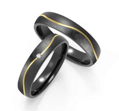 China Trend Round Black Titanium Ring With IP Gold Line Inset Zircon Couples Ring for sale
