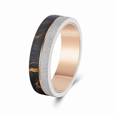 China Customizable Width Forged Carbon Fiber Ring with Rose Gold Plating and Unique Marbled Patterns for Men's Wedding Band for sale
