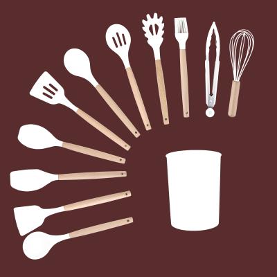 China Conjunto de utensílios de cozinha de alça de madeira com caixa de suporte e ferramentas de cozinha de silicone não pegajoso à venda