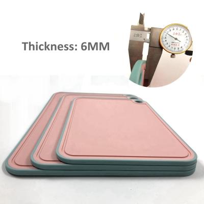 China Customizable Multifunction Kitchen Plastic Index Anti-slip PP Chopping Block Cutting Board Set With Stand for sale