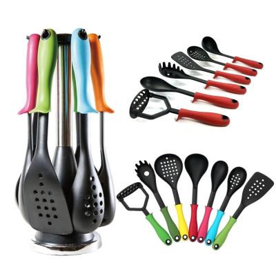 Cina Eco-friendly Cucchiaio solido cibo Turner Spatula cucchiaio a fessure Whisk Acacia Silicio utensili da cucina in vendita