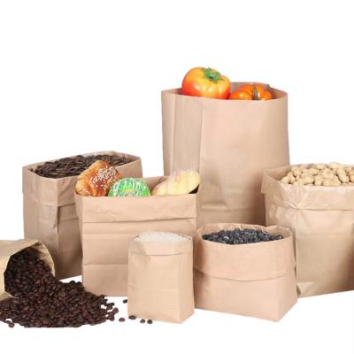 China Recyclable Art Paper Kraft Bag With Square Bottom Hand Length Handle Customizable Sizes for sale