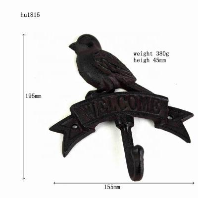 Cina Ganci antichi del cappotto del ferro del nero di forma dell'uccello del supporto della parete in vendita