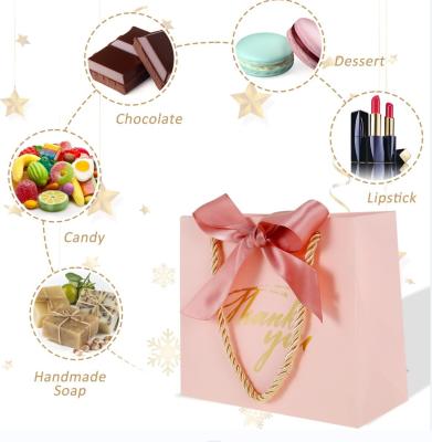 China Rigid Boxes Custom Logo Clothing Packaging Deluxe Paper Bags with Handles for sale