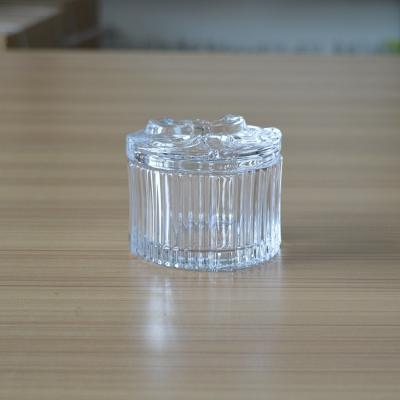 China Unique transparent  glass jar with bowknot shape lid for candy /storage for sale