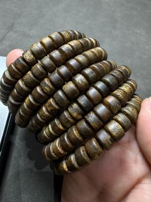 China Dark Brown With Natural Wood Grain Natural Agarwood Rosary Durable Resistant To Wear Ideal For Meditation Prayer And Spiritual for sale