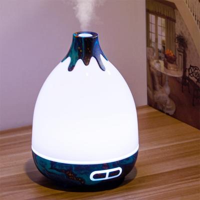 China Fragrance Diffuser Humidifier Premium Volcano-Shaped Ultrasonic Fragrance Diffuser LED Air Purifying for sale