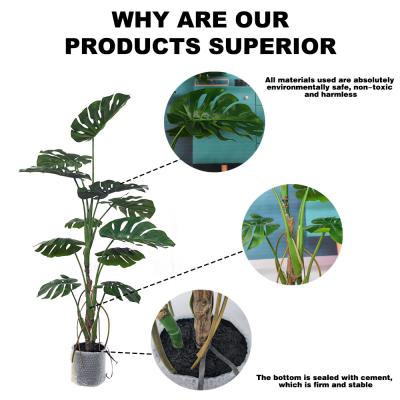 China Potted Indoor Plastic Artificial Monstera Plant For Dining Room Decoration for sale