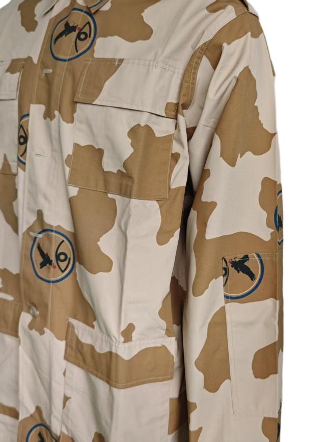 Military personnel wearing BDU uniform in field