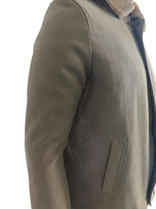 Khaki military jacket side view showing pockets