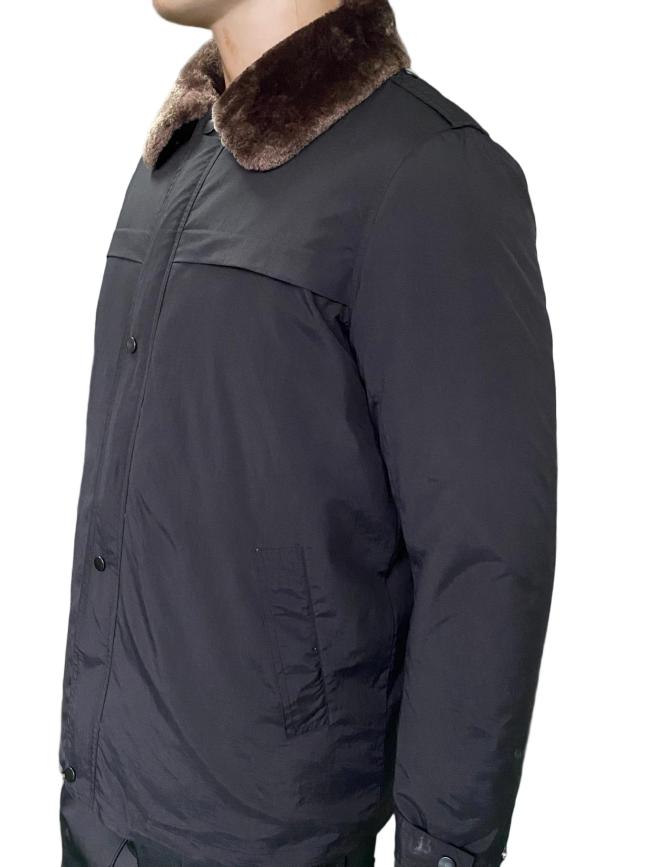 Military jacket being worn in outdoor setting